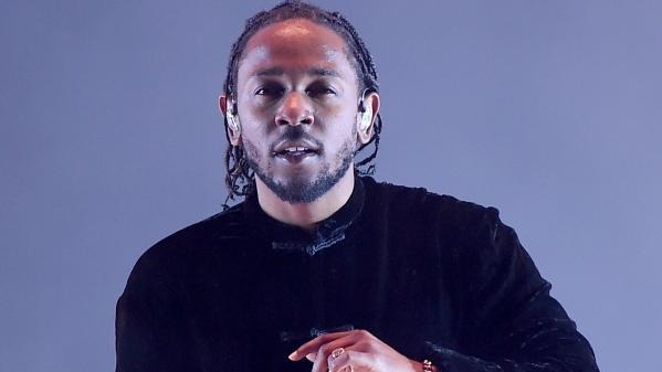 Kendrick Lamar wears a diamond-encrusted "crown of thorns" to raise ...